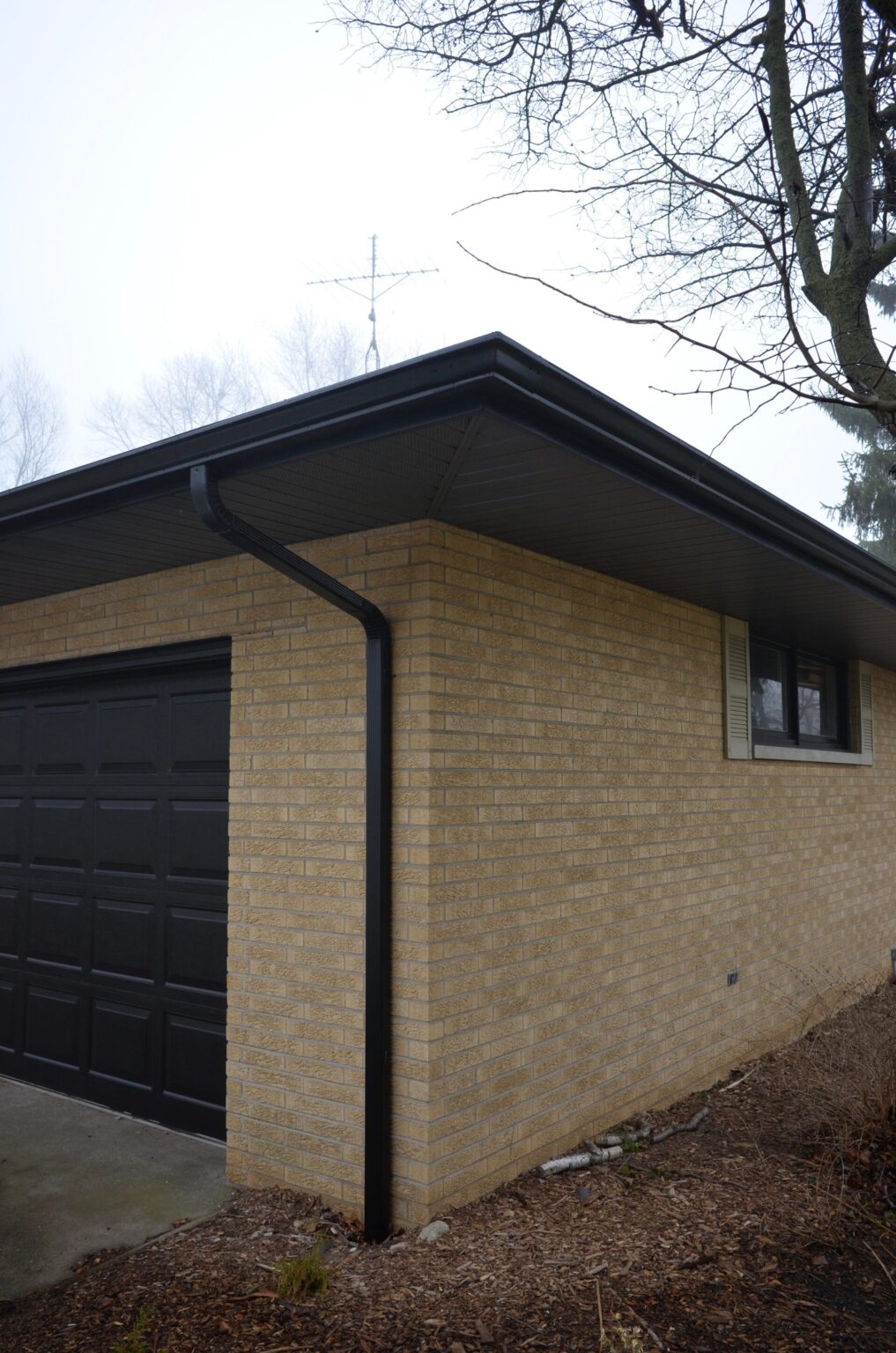 Seamless Gutters - Pewter/Tuxedo Gray - Dennison Roofing & Gutter Toppers